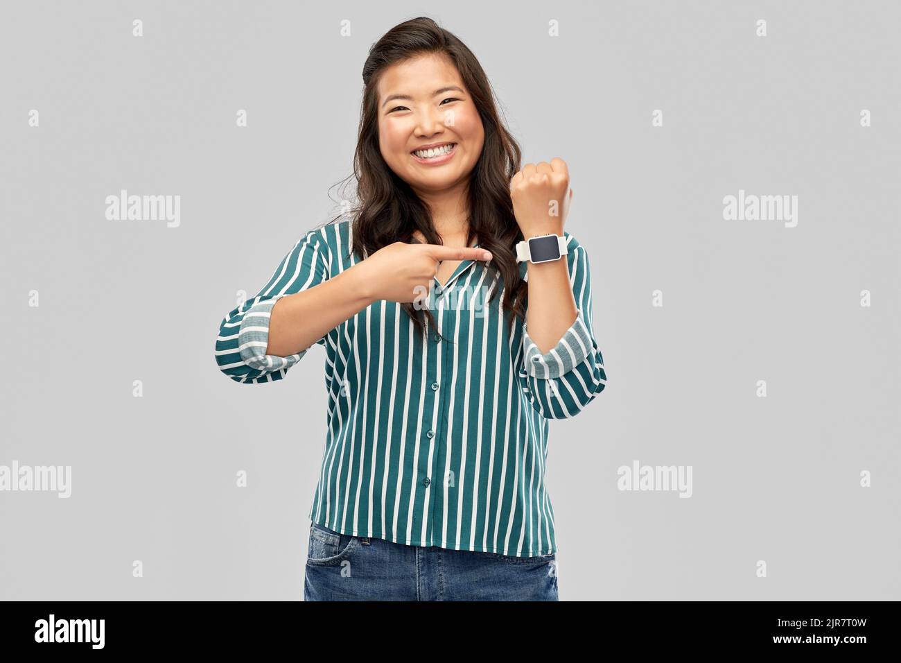 Smiling gadget hi-res stock photography and images - Alamy