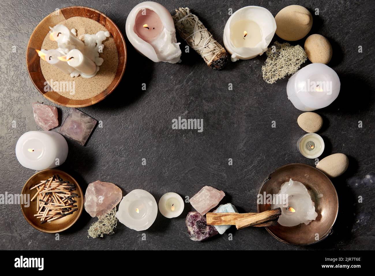 frame of candles and staff for magic ritual Stock Photo - Alamy