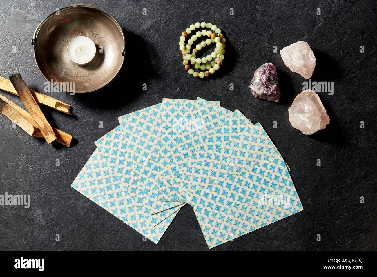 tarot cards and magic staff for divination ritual Stock Photo - Alamy