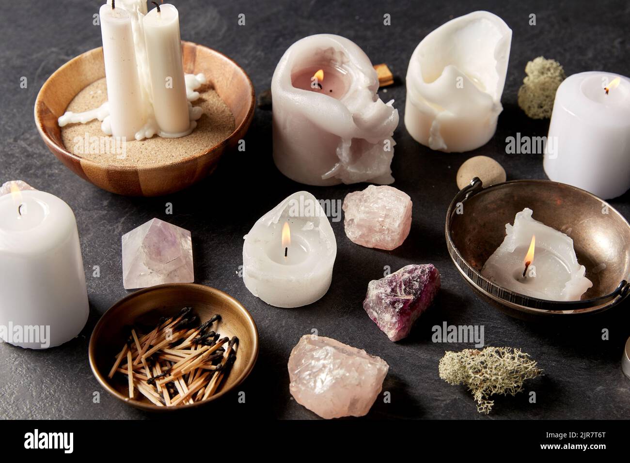 burning candles and crystals for magic ritual Stock Photo - Alamy
