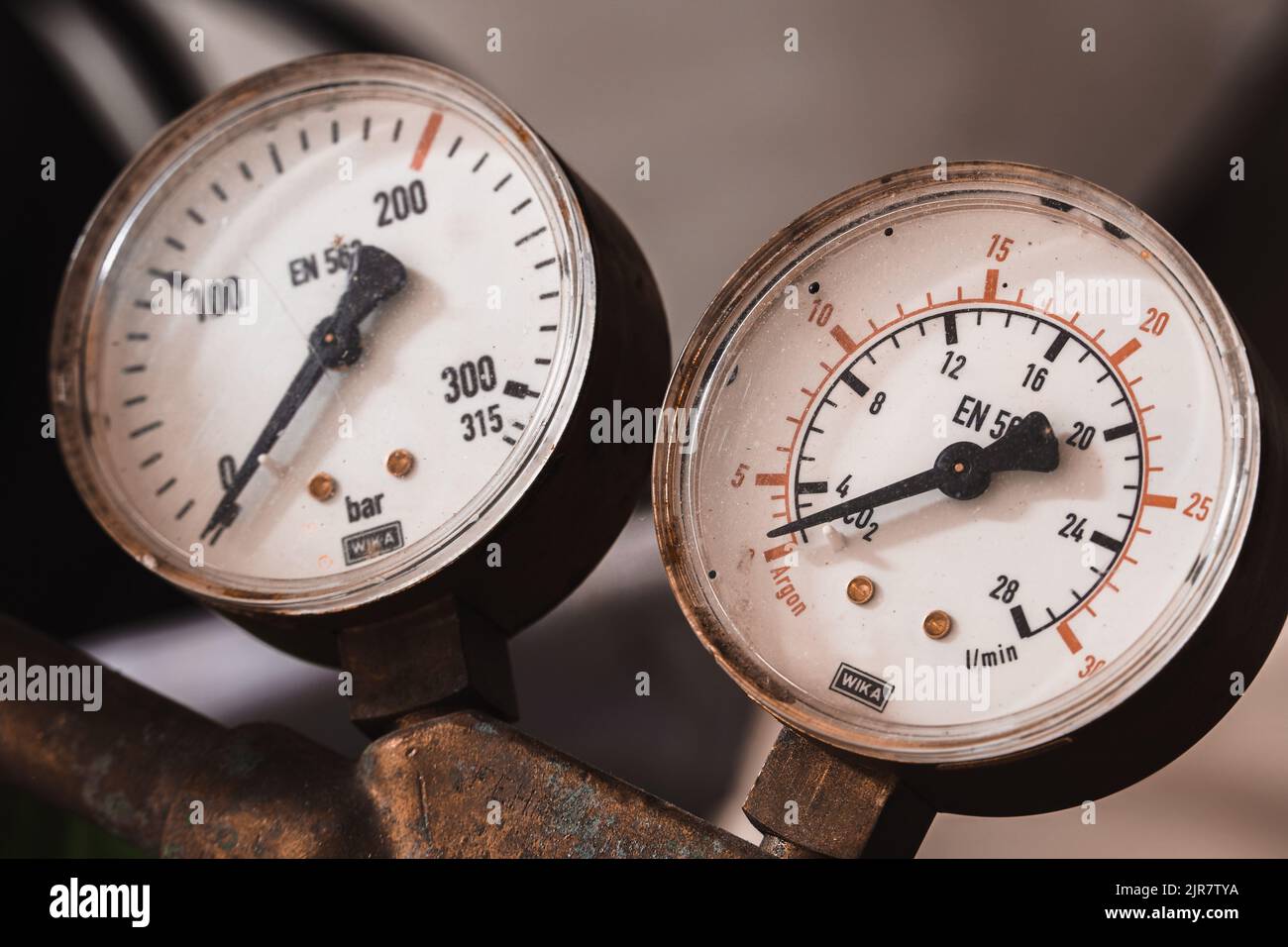 A closeup of manometers on a rusty pipe Stock Photo - Alamy