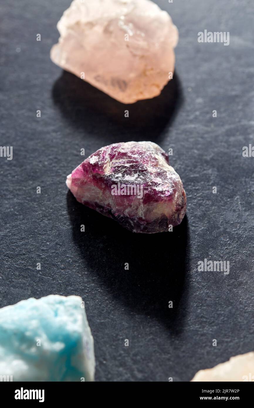 quartz crystals and gem stones on slate background Stock Photo - Alamy