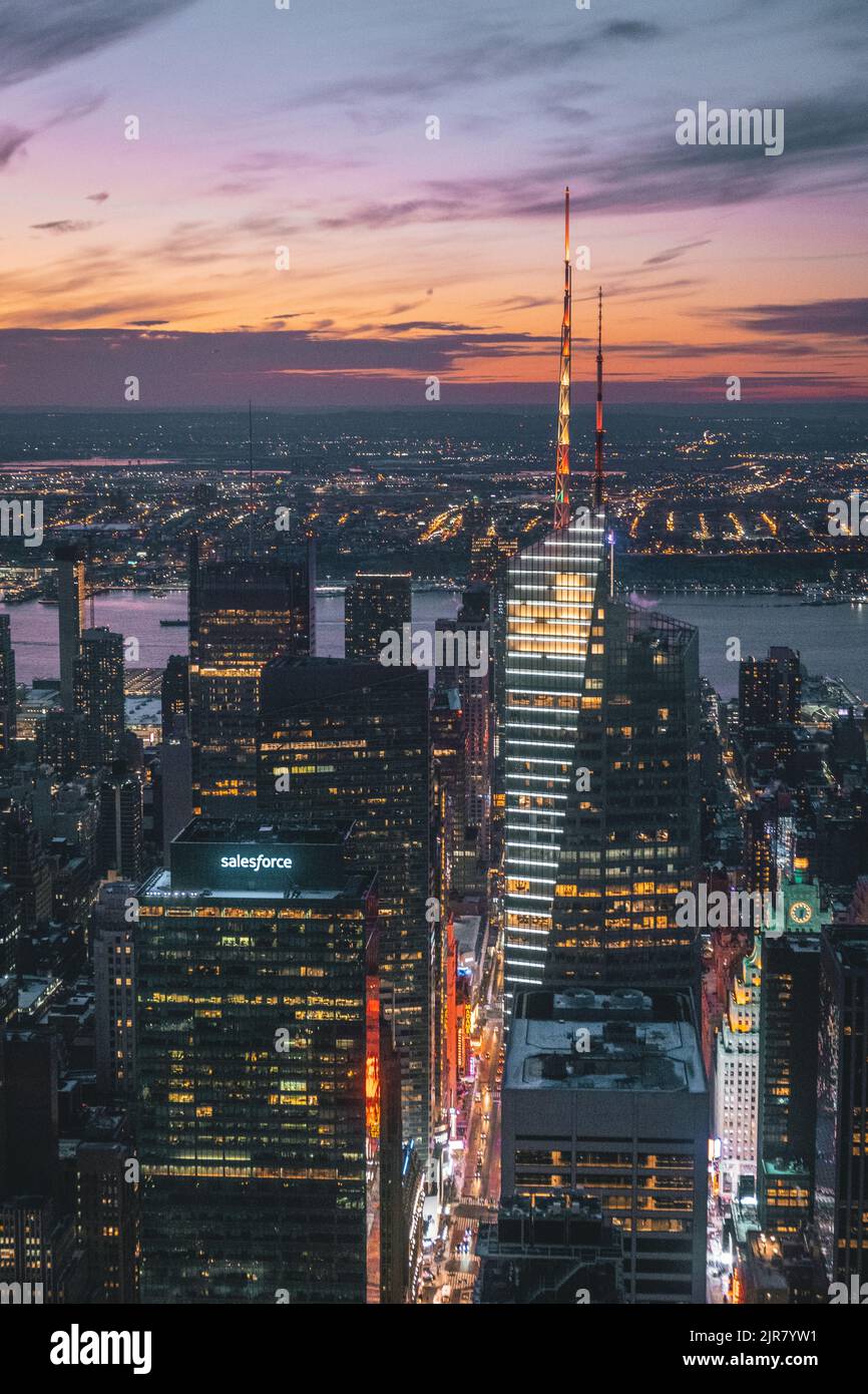 A vertical shot of New York skyline at sunset with the skyscraper ...