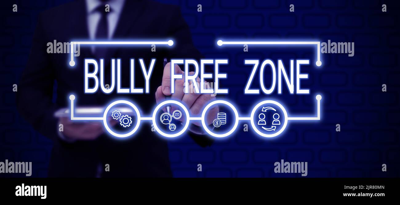 Hand writing sign Bully Free Zone. Business idea Be respectful to other ...