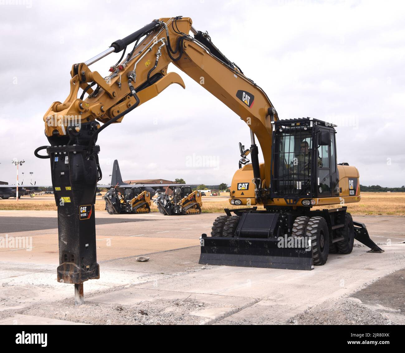 A U.S. Air Force 100th Civil Engineer Squadron Airman uses an excavator ...