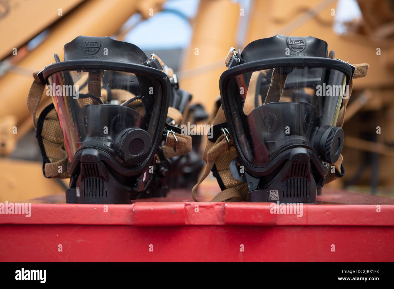 Self containing breathing apparatus (SCBA) masks dry off after being ...