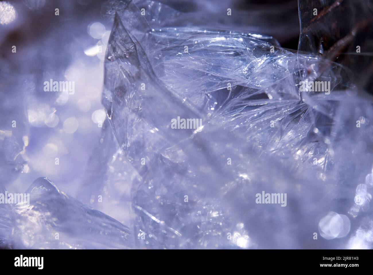 Abstract background, semi-transparent purple crinkled synthetic ...