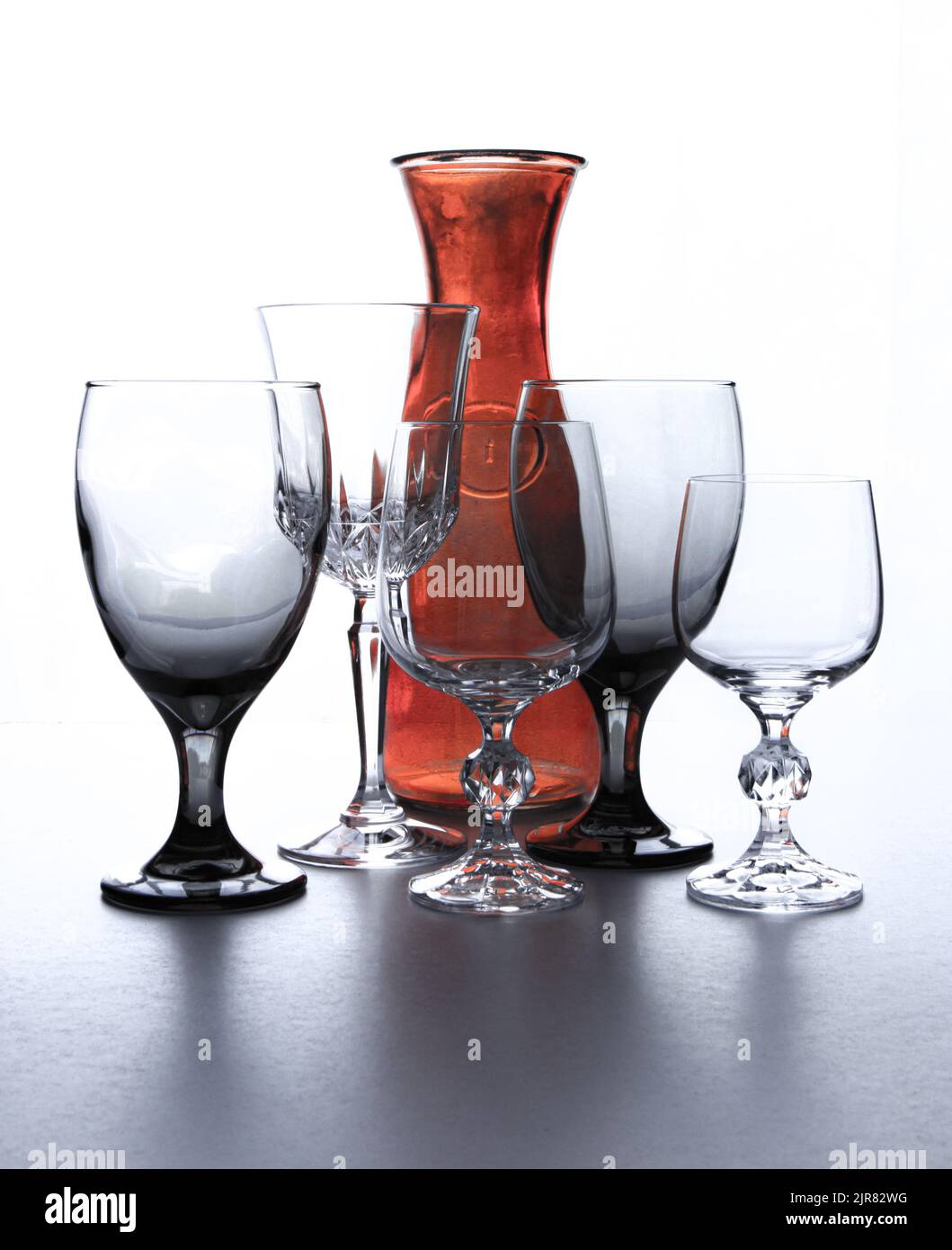 Orange decanter and goblets Stock Photo - Alamy