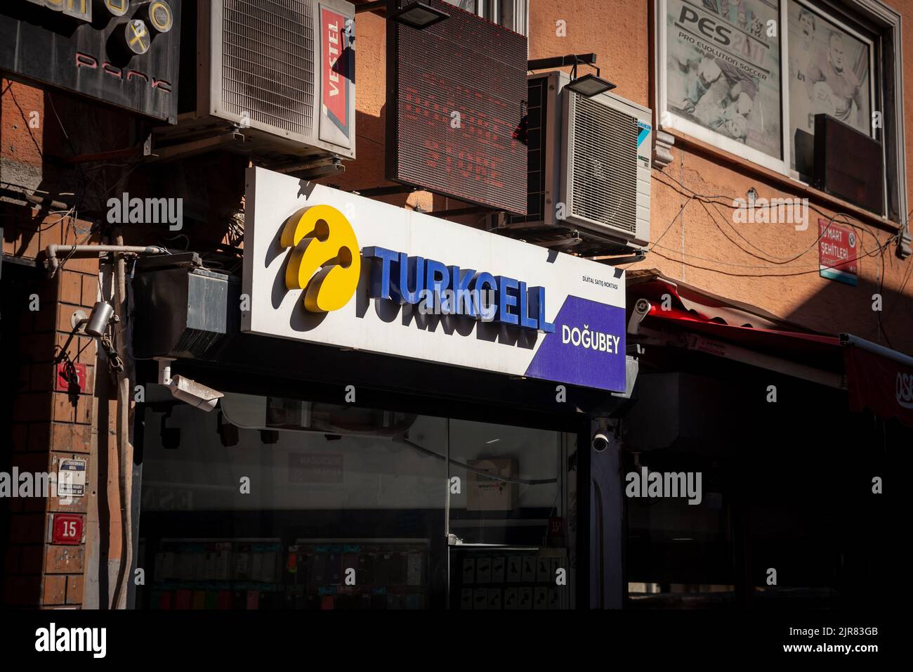 Picture of a sign with the logo of Turkcell on their logo on their ...