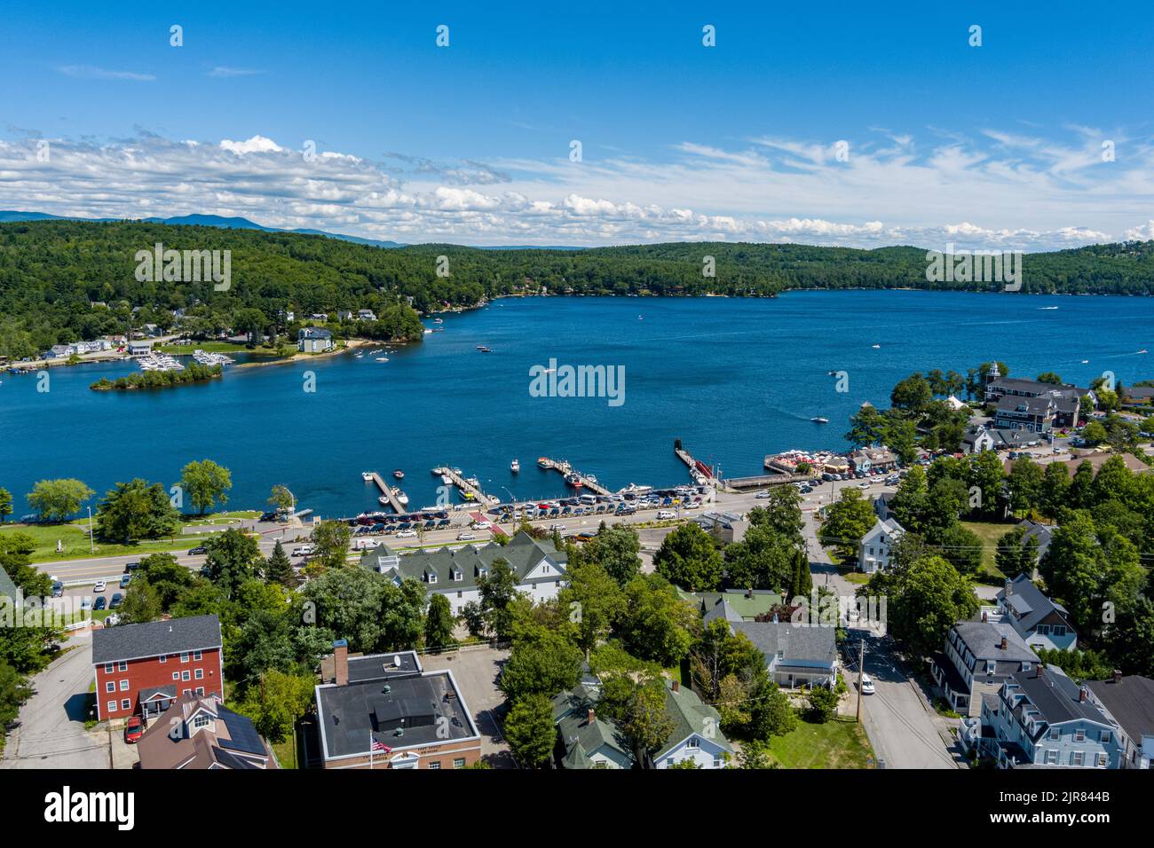 Low level aerial of the Town of Meredith and Lake Winnipesaukee in ...