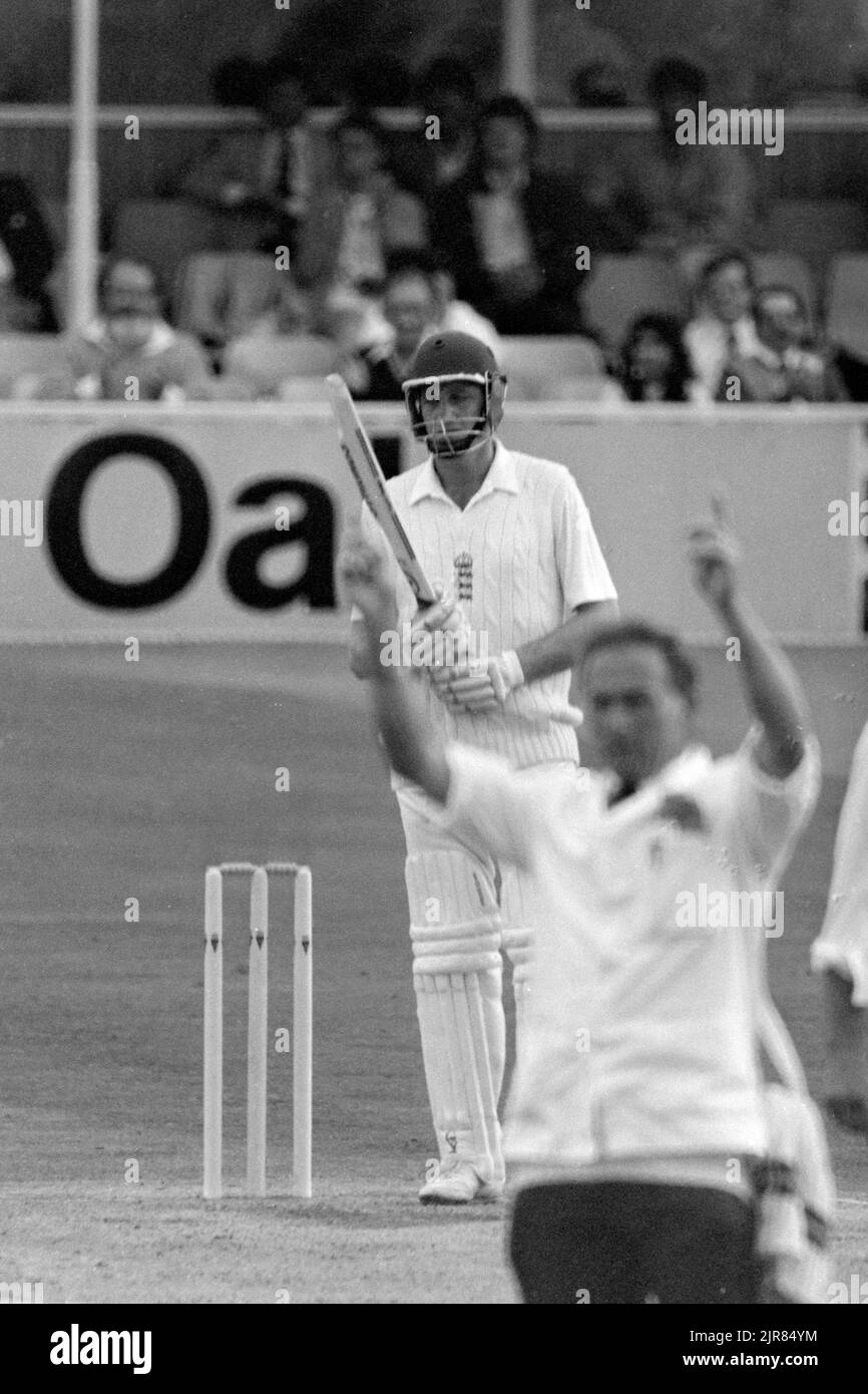 John Emburey, batting for England, watches as the Umpire signals a “Six ...