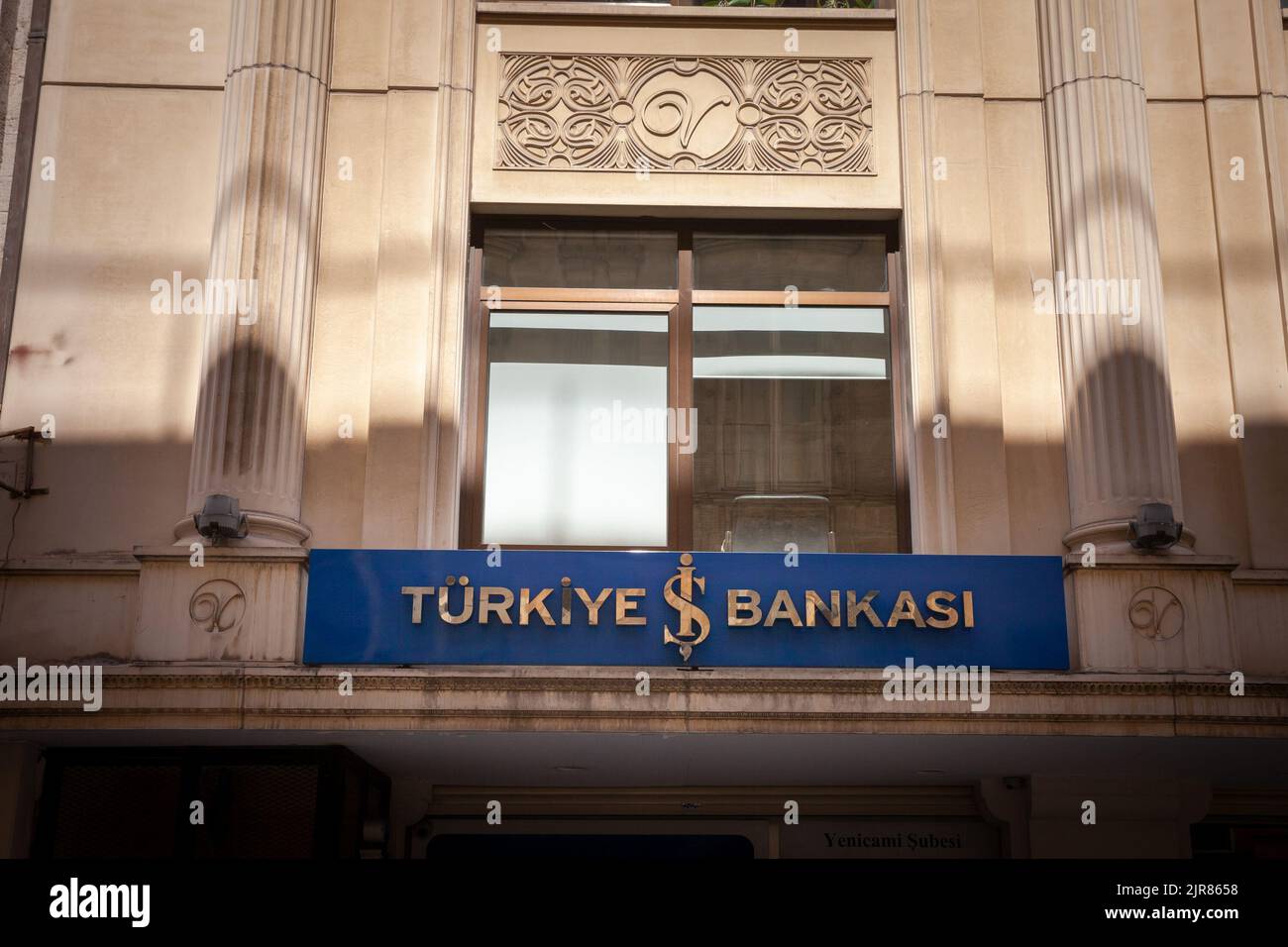 Picture of a sign with the logo of Turkiye IS Bankasi taken in front of ...