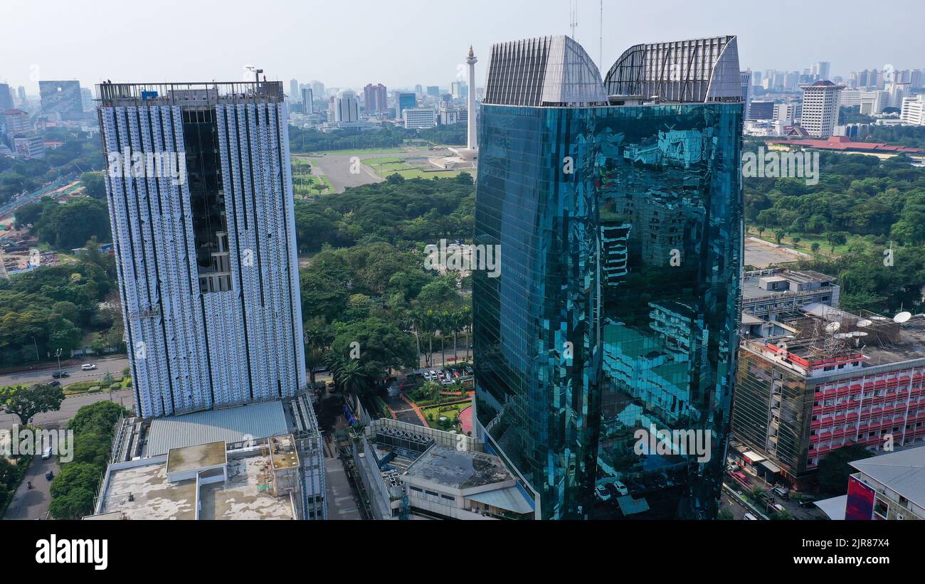 Blue glass OFFICE BUILDING IN CENTRAL JAKARTA. The ministry of state ...
