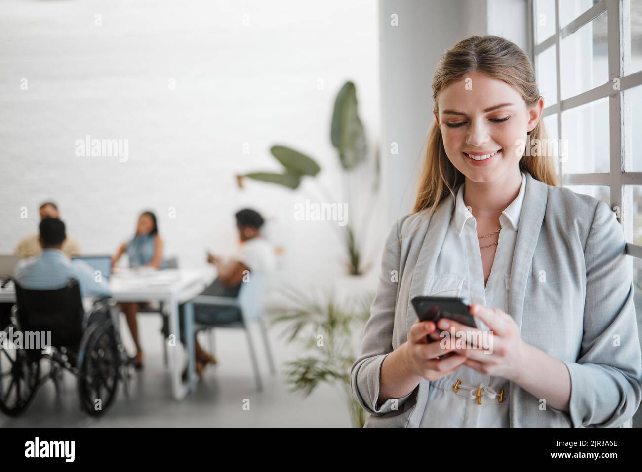 Phone Networking And Communication With A Business Woman On Social Media In An Office For A