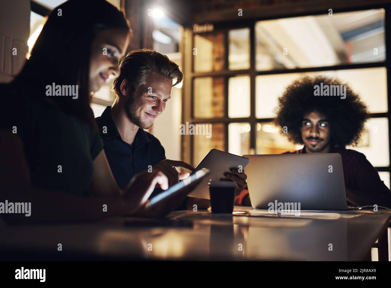 Its a meeting of creative minds. a group of young designers having a ...