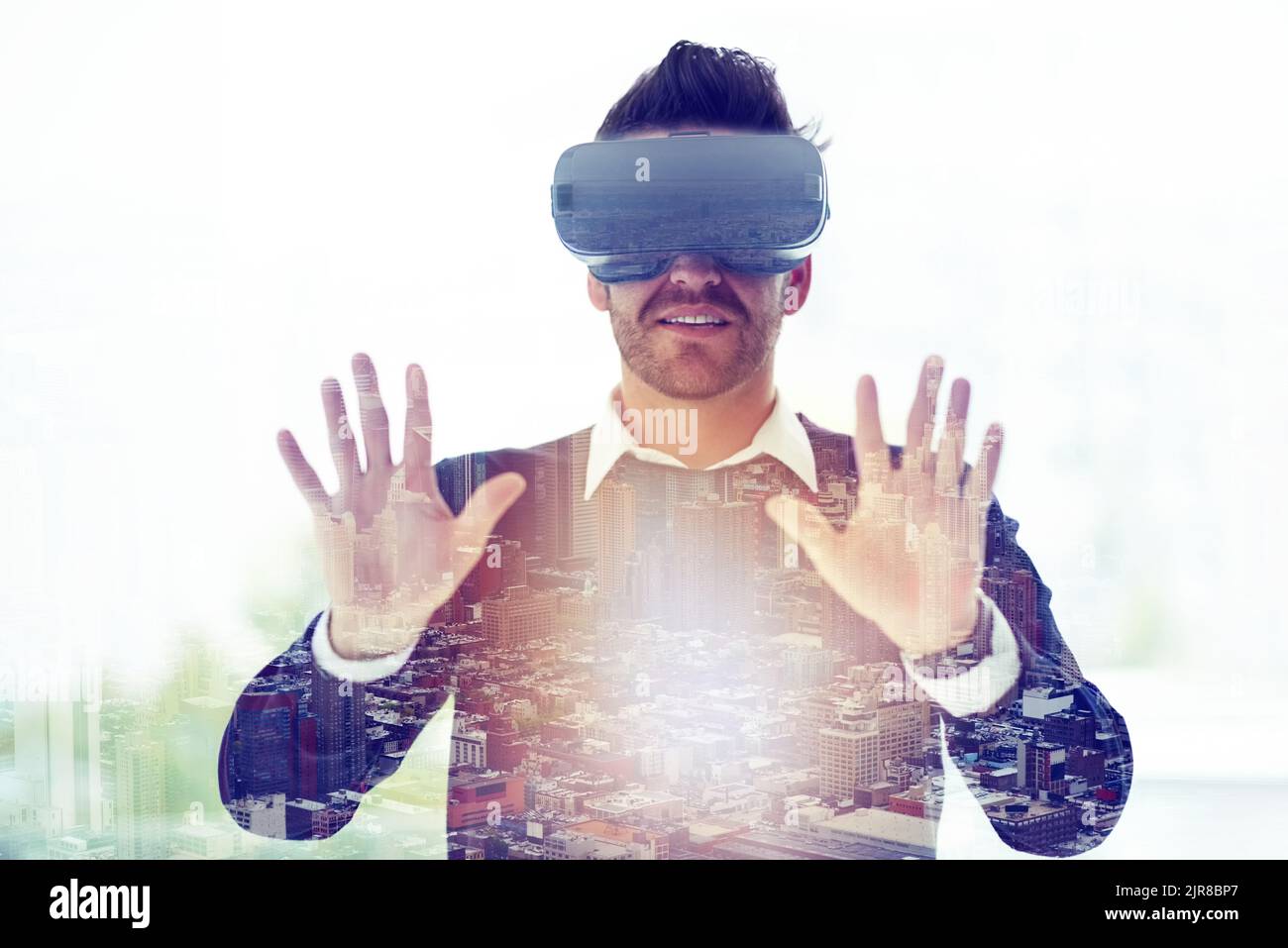 Glancing into the future. Multiple exposure shot of businessman wearing ...
