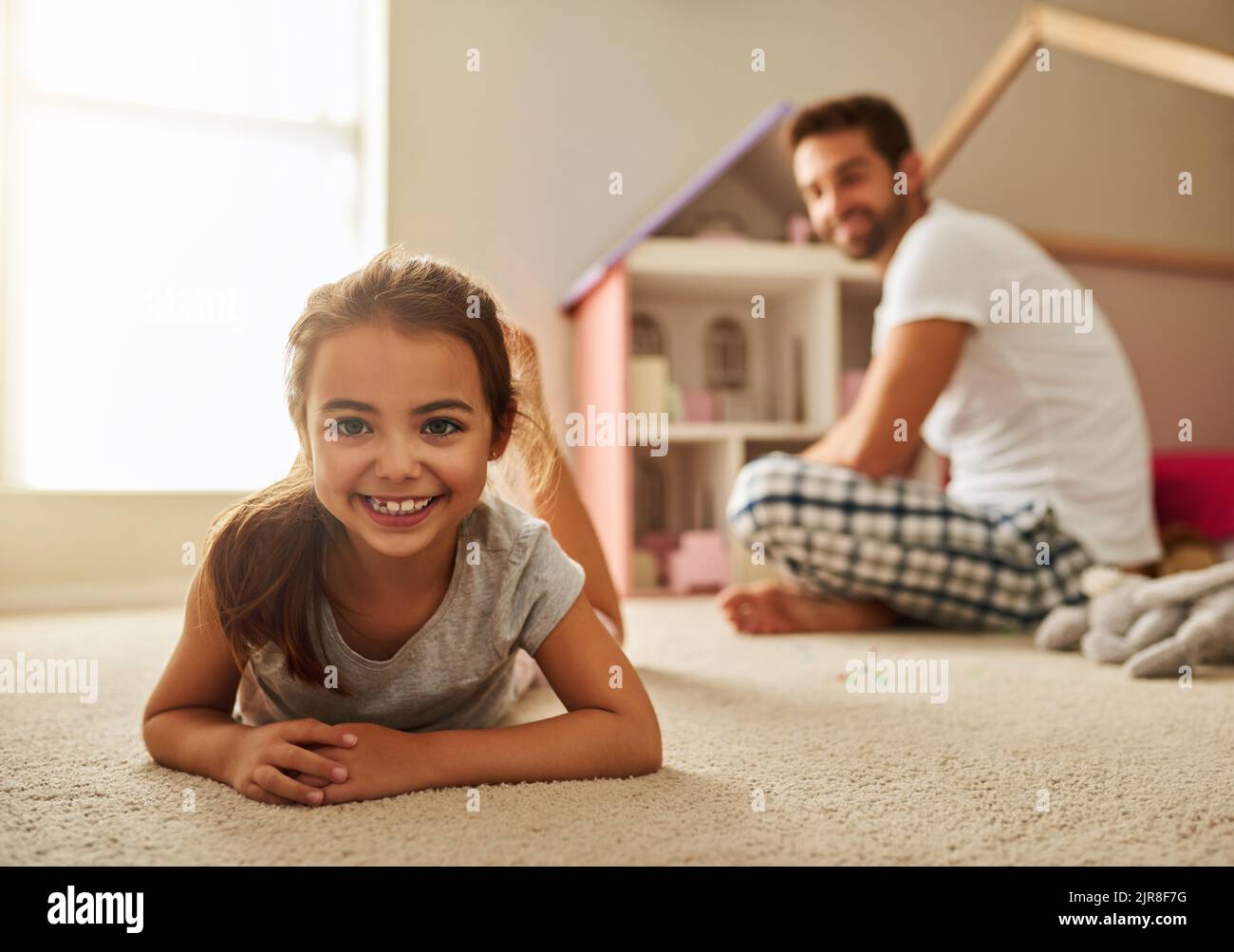 I Think Daddys Having More Fun Than Me Portrait Of An Adorable Young