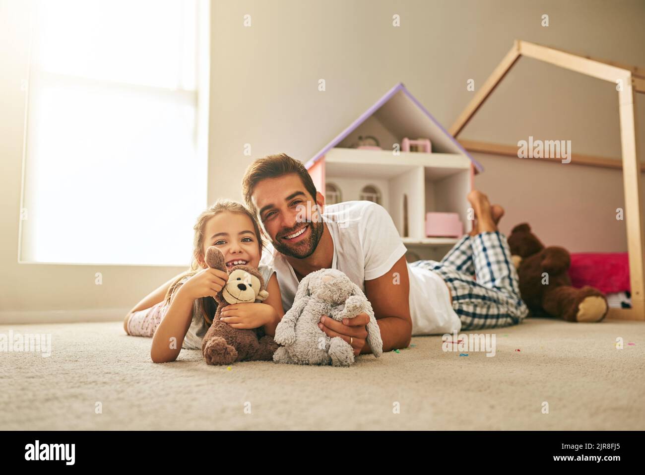 He always has time for his little girl. Portrait of a handsome young ...