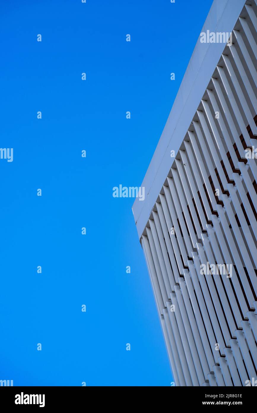 Corner of a modern steel building with geometric surface Stock Photo ...