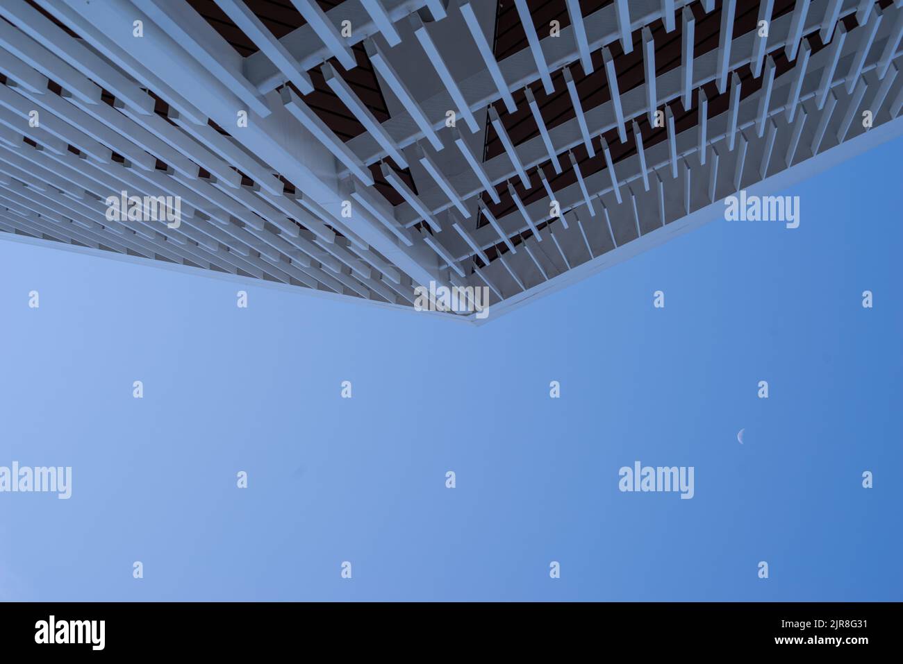 Corner of a modern steel building with geometric surface Stock Photo ...