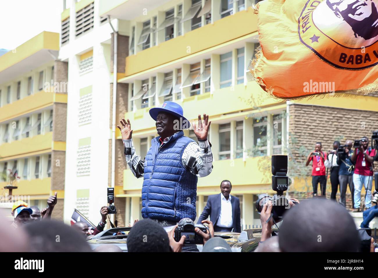 Azimio la Umoja presidential candidate Raila Odinga (C) waves to his ...