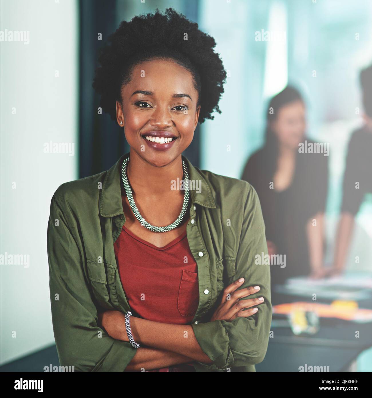 Success forms naturally when you love what you do. Portrait of a businesswoman standing in an ...