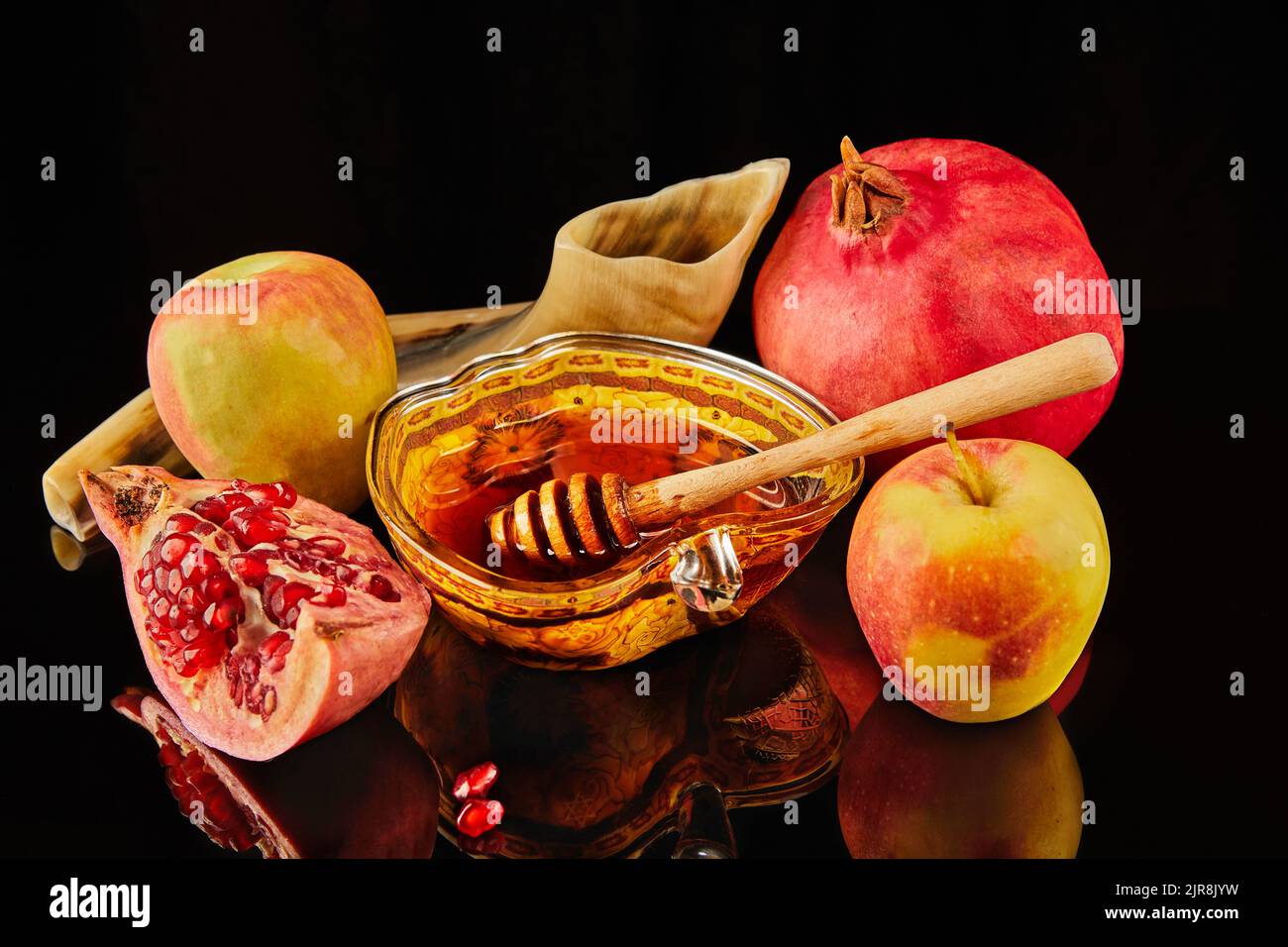 Rosh hashanah - jewish new year holiday concept. Apple-shaped bowl with ...