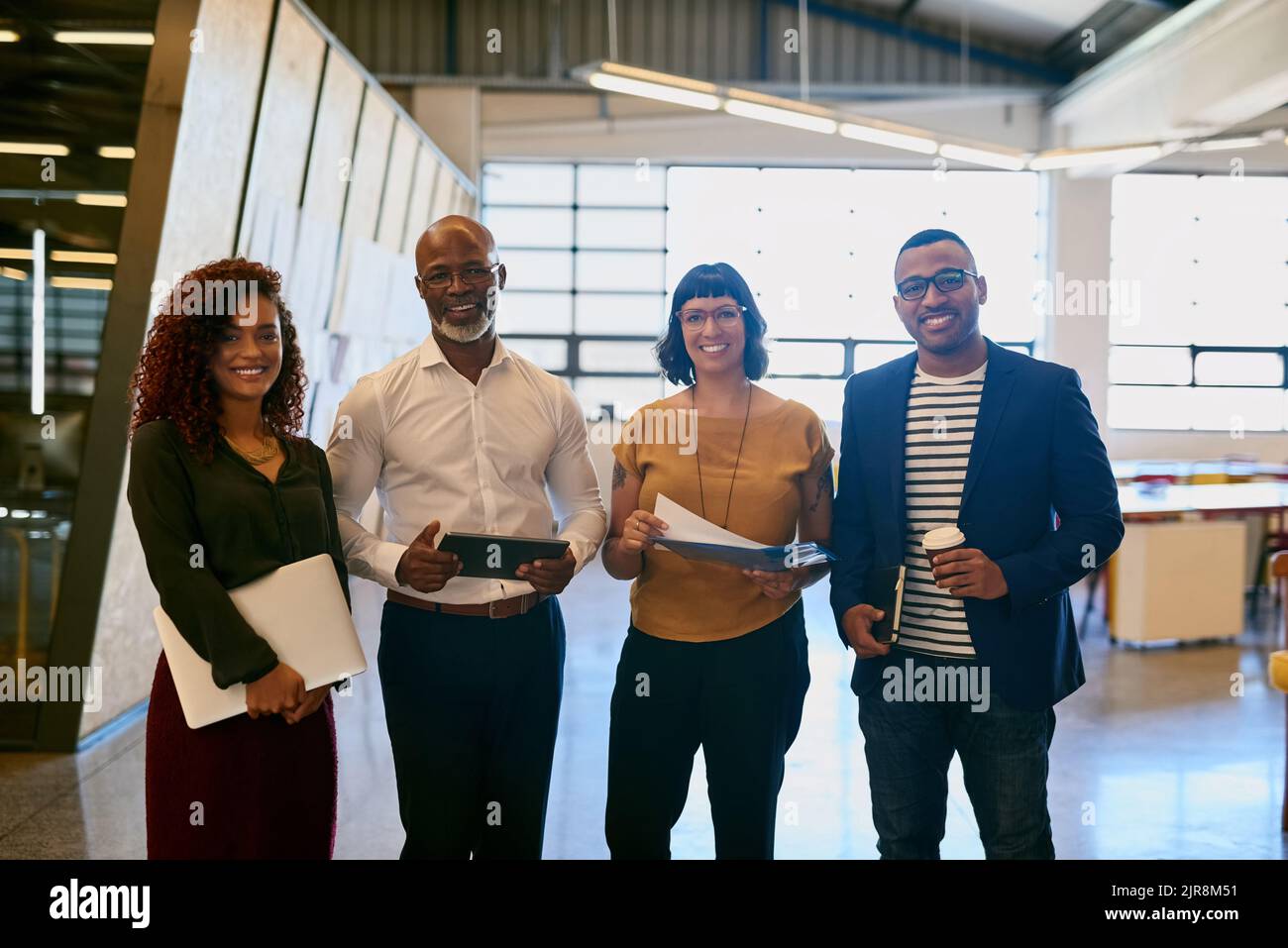 Strong teams are the foundation of high-performing business. Portrait ...