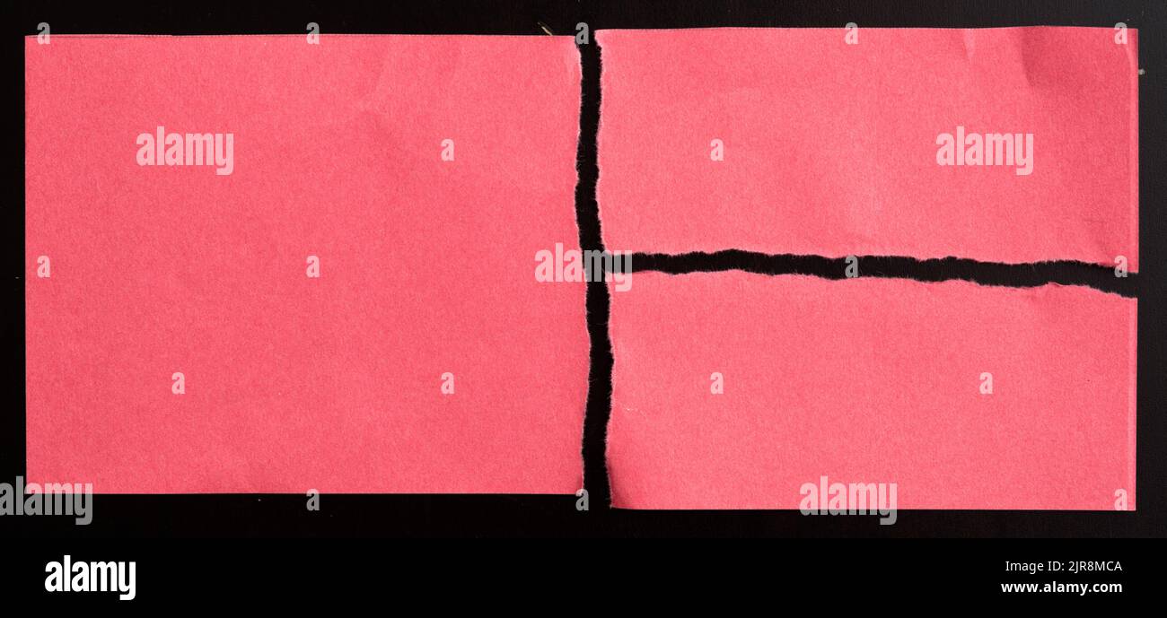Red torn paper on black background Stock Photo - Alamy