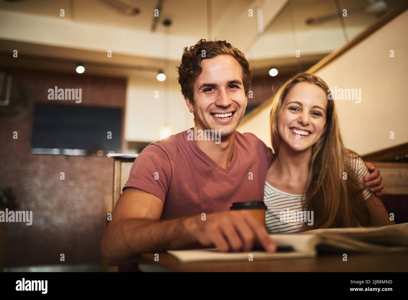 Our studies have brought us closer. Portrait of a happy young student ...