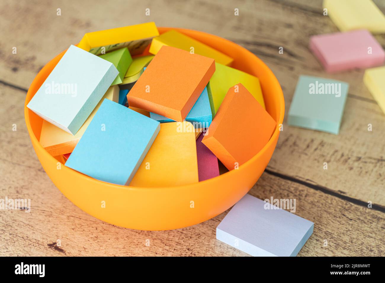 pile of sticky notes on office table at work Stock Photo - Alamy