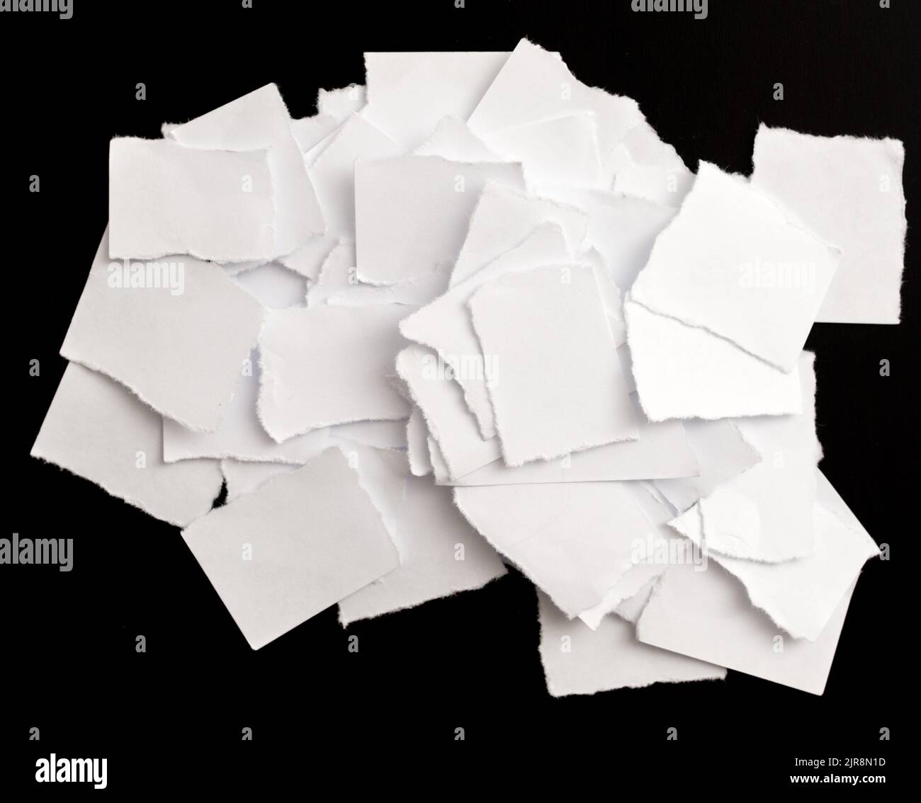 White torn paper on black background Stock Photo - Alamy