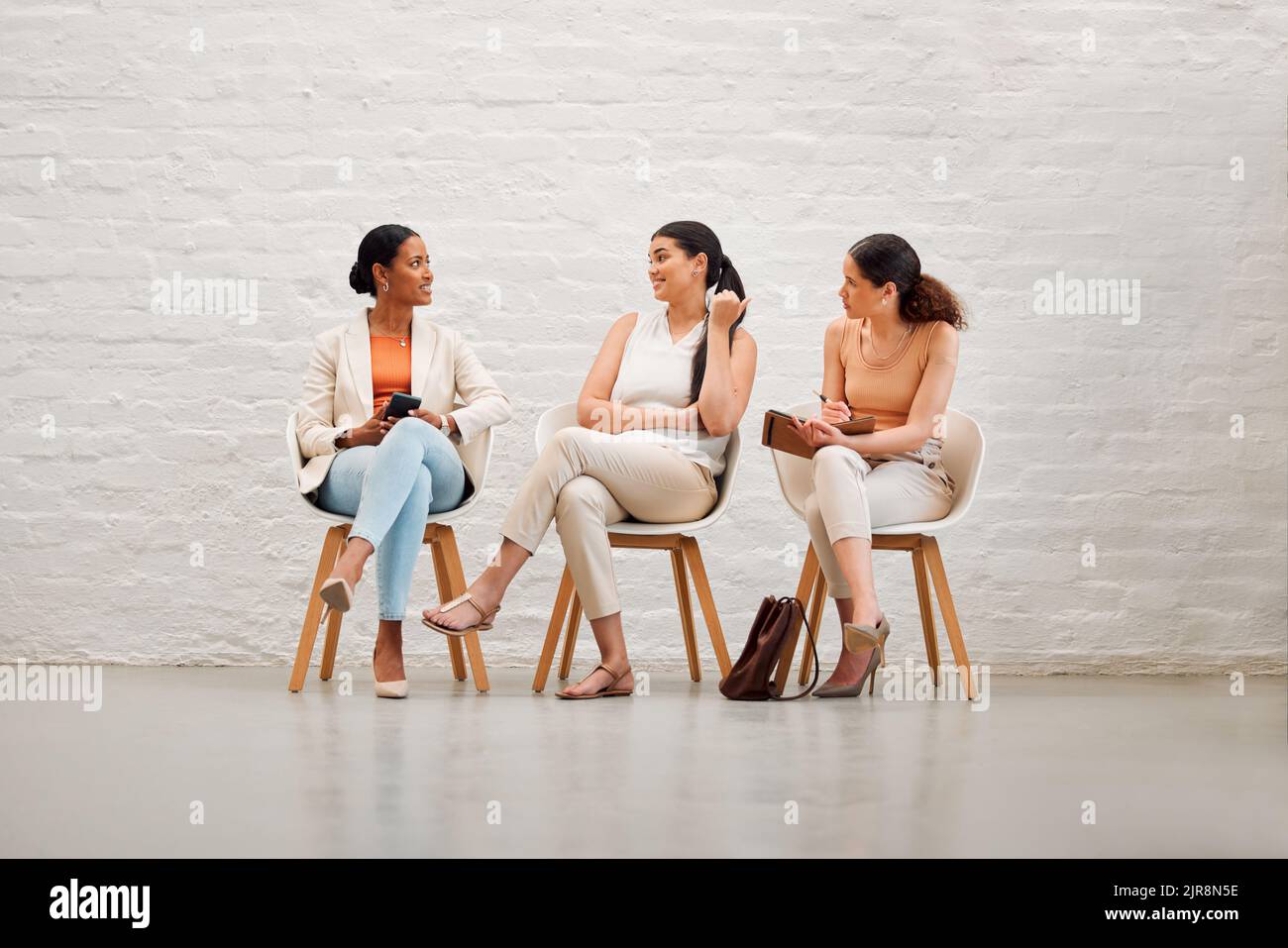 Women in waiting room for interview, hiring or recruitment meeting with ...