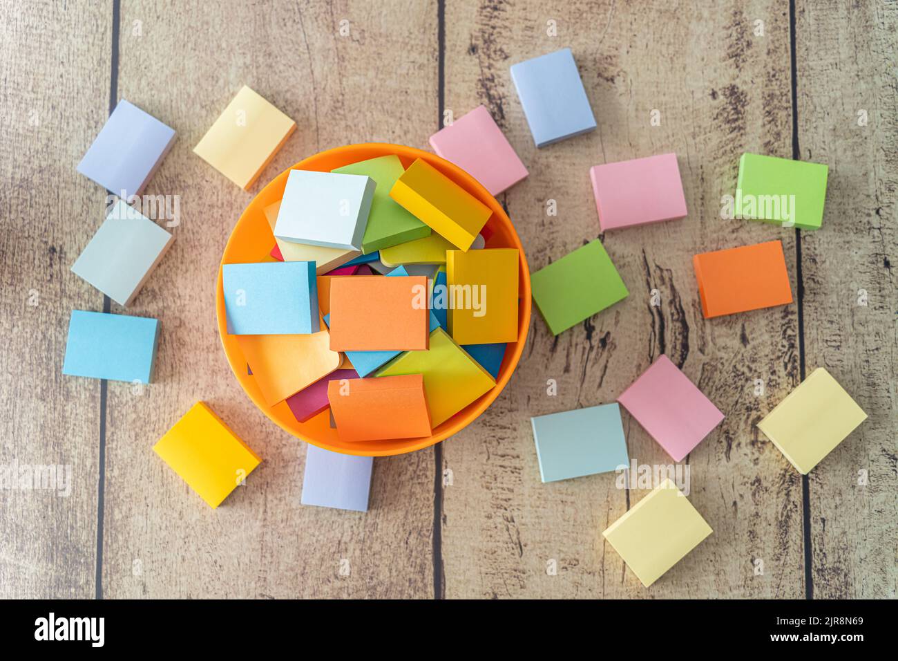 pile of sticky notes on office table at work Stock Photo - Alamy