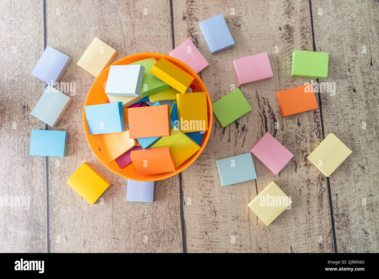 pile of sticky notes on office table at work Stock Photo - Alamy