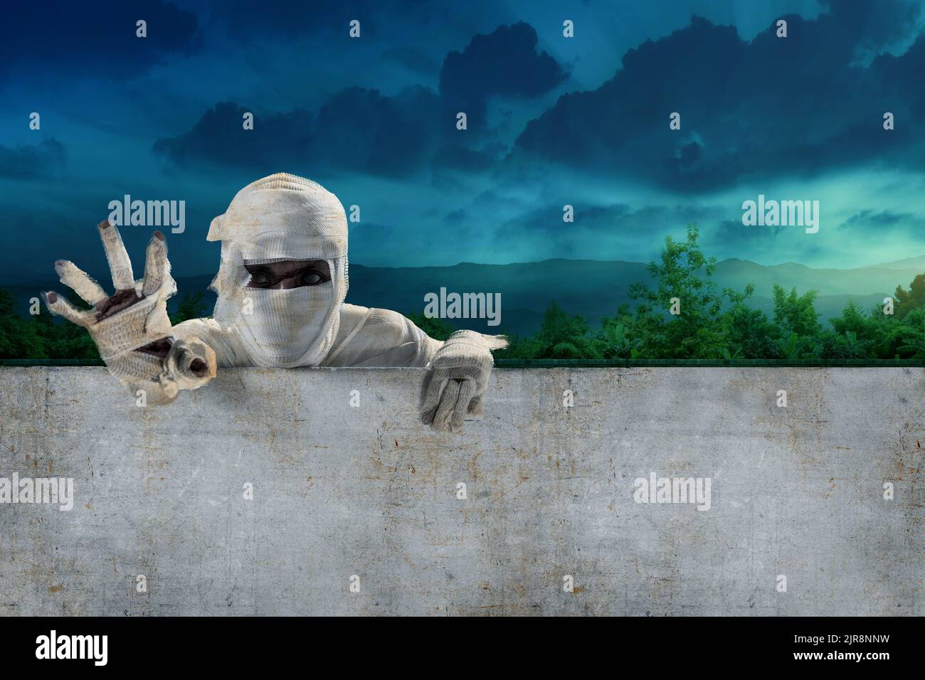 Mummy Comes From Behind The Wall With A Night Scene Background