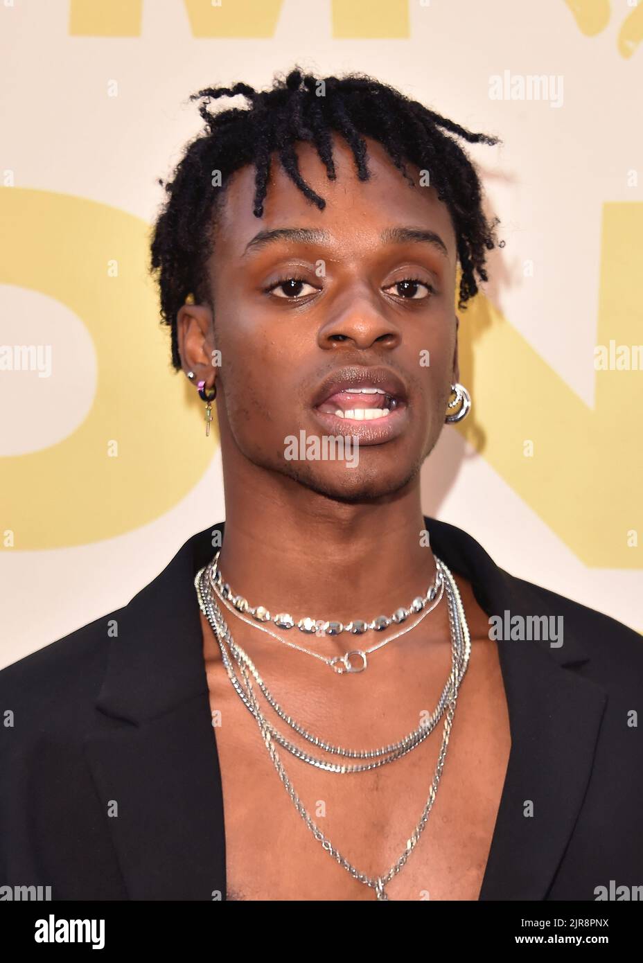 Austin Crute walking the red carpet at the premiere of "Honk For Jesus ...