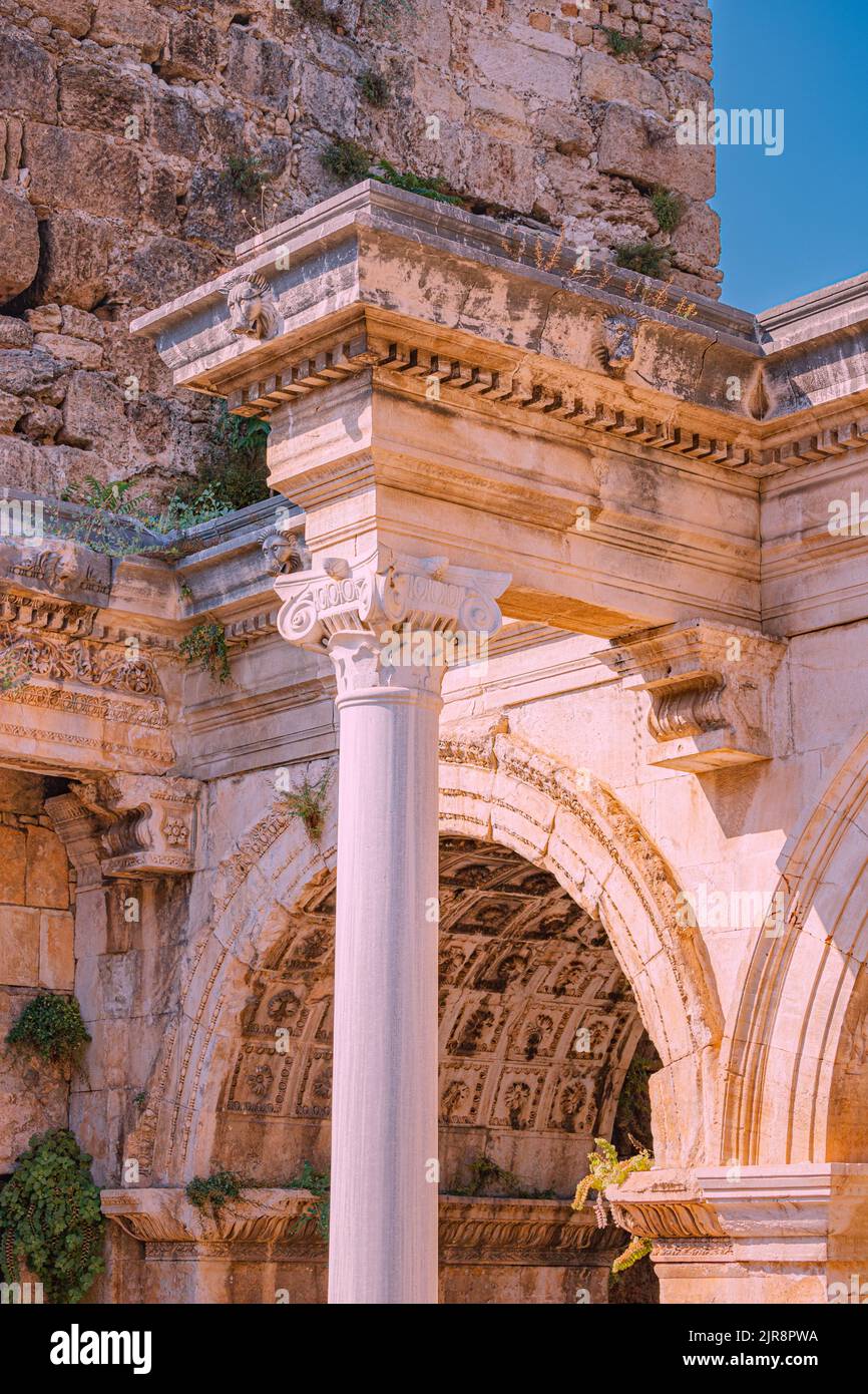 Close-up details of a famous gate or Hadrian's Arch in Antalya. Travel ...