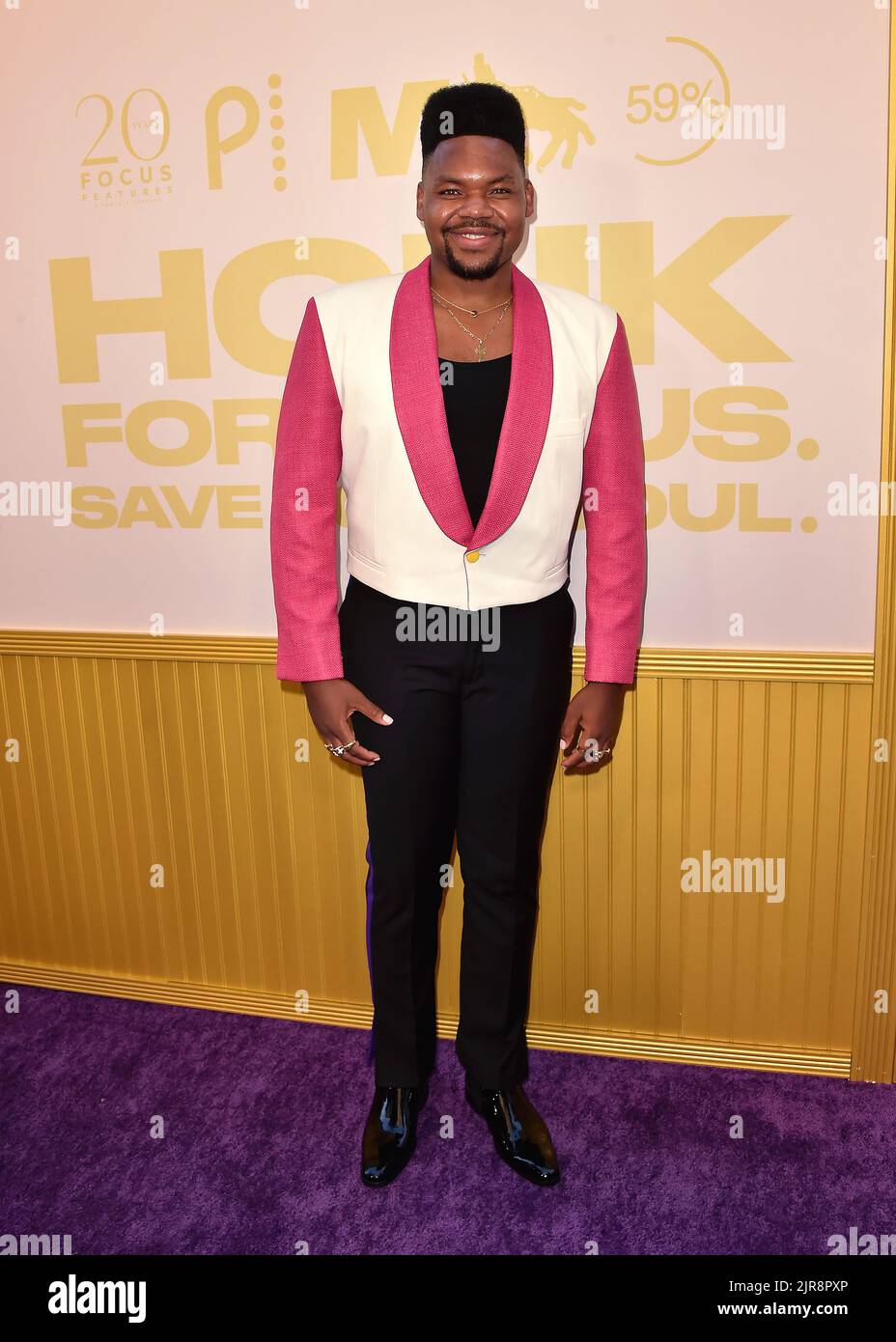 Devere Rogers walking the red carpet at the premiere of "Honk For Jesus ...