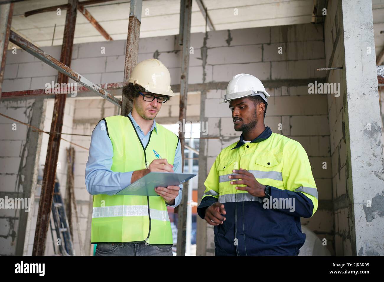 Residential Building. Construction Industry. Caucasian Contractor in ...