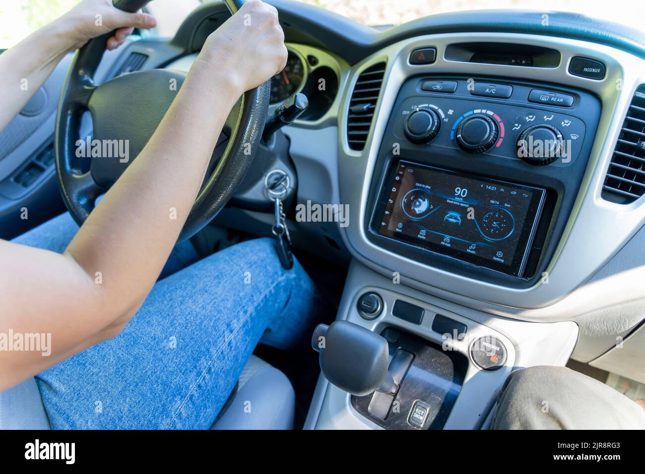 Woman Listening To Radio In Car