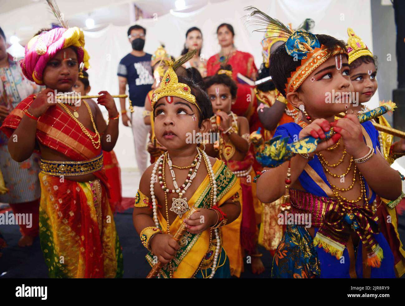 Children dressed as Lord Krishna participate in a dress competition ...