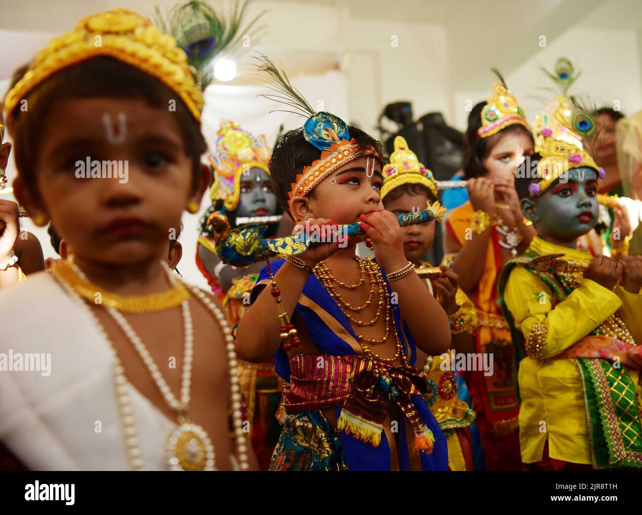Children dressed as Lord Krishna participate in a dress competition ...