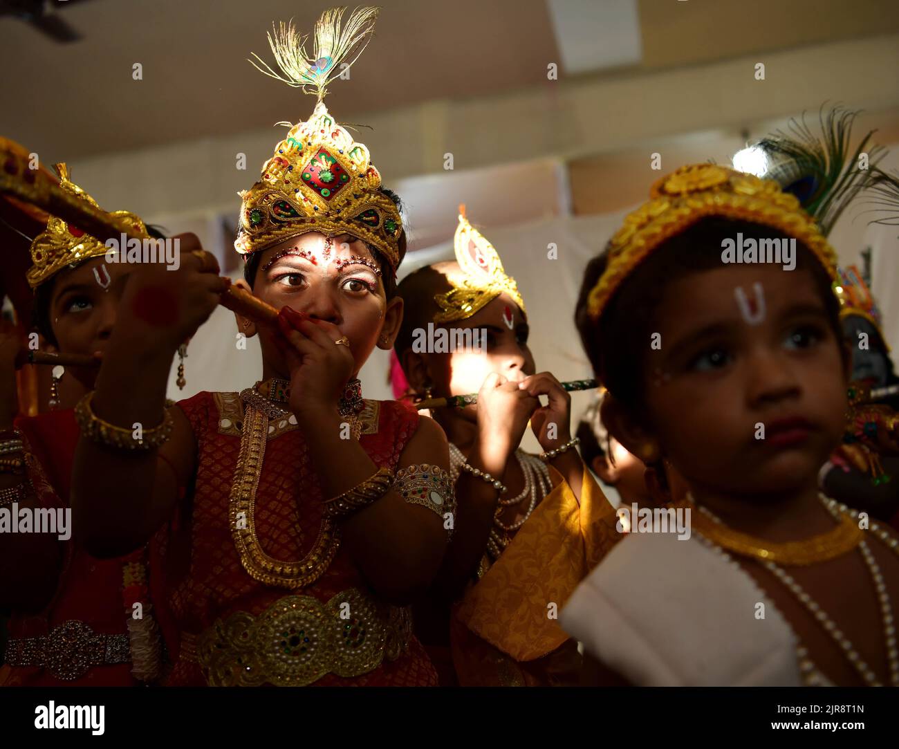 Children dressed as Lord Krishna participate in a dress competition ...