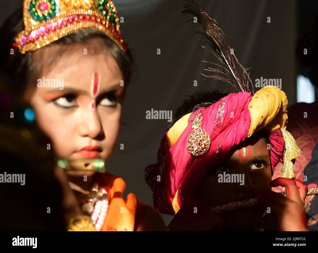 Children dressed as Lord Krishna participate in a dress competition ...