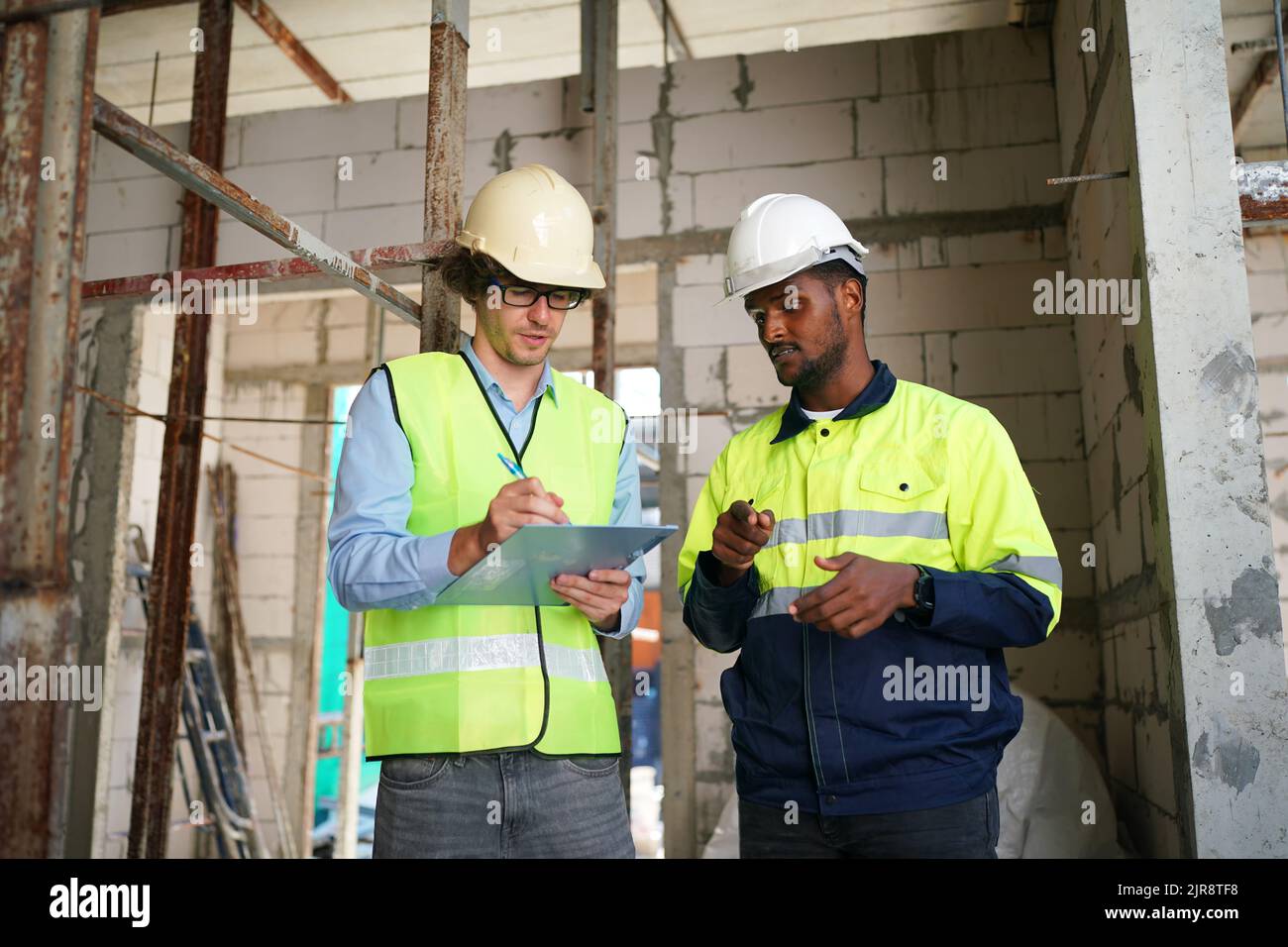 Residential Building. Construction Industry. Caucasian Contractor in ...