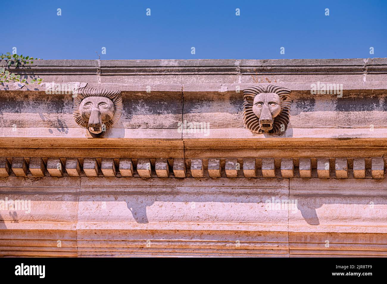 Close-up details of a famous gate or Hadrian's Arch in Antalya. Travel ...