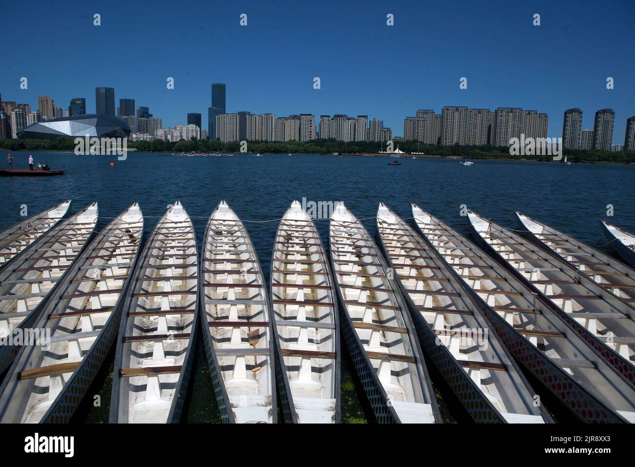 SHENYANG, CHINA - AUGUST 23, 2022 - Dragon boats are seen on the water ...