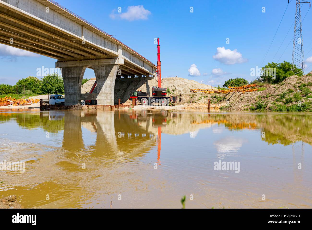 View of the unfinished bridge, road over river is under construction ...