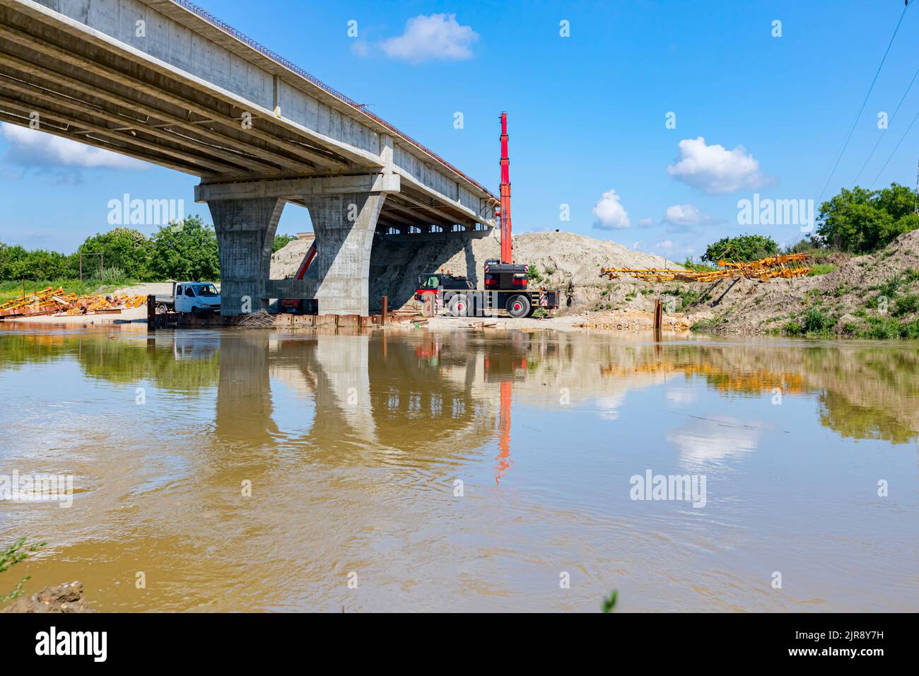 View of the unfinished bridge, road over river is under construction ...